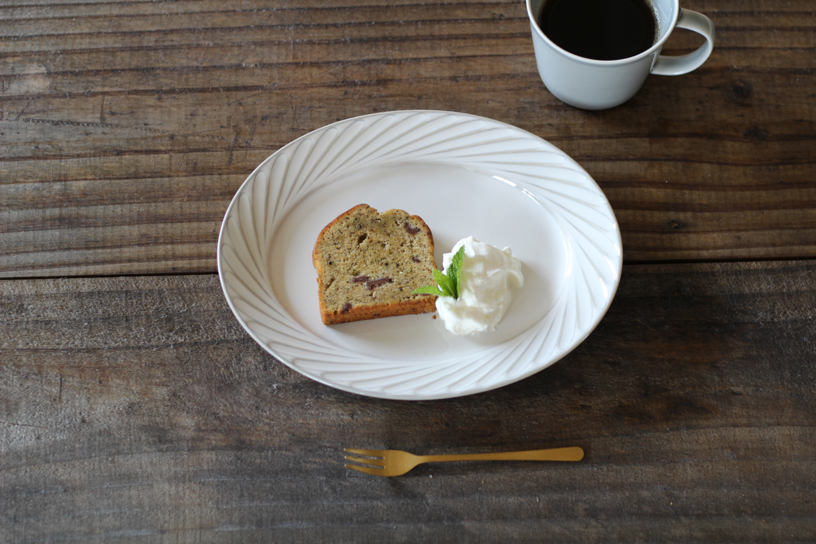 Rondo 23.5オーバル皿 しのぎクリーム | 小田陶器公式サイト